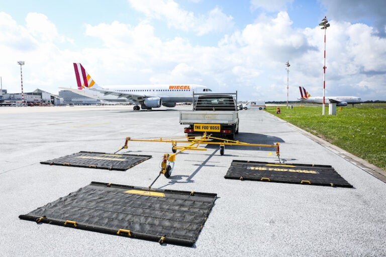 Removing foreign object debris at airfields
